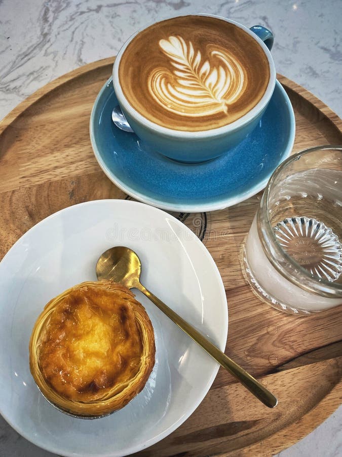 Coffee and egg tart stock photo. Image of coffee, treat - 285456320