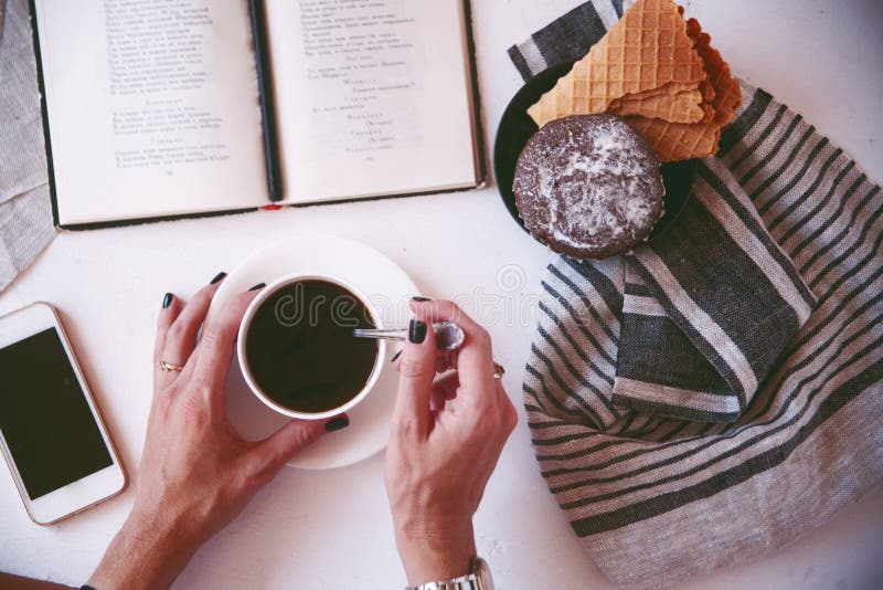 Coffee and favorite book stock photo. Image of girls - 77032038