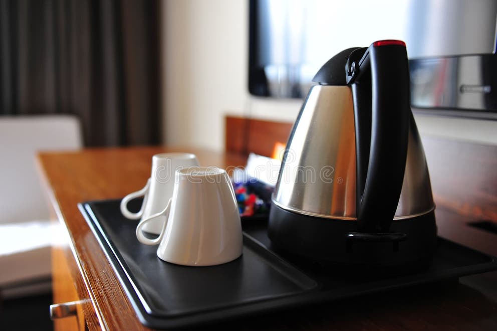 Coffee flask in hotel room stock photo. Image of light - 18229998