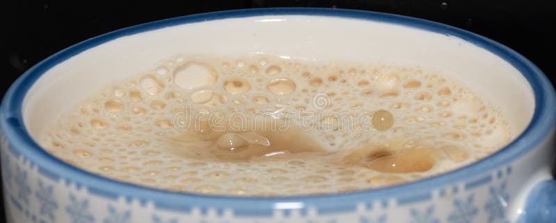 Coffee Foam or Froth Seen Close Up while Dripping into Cup Stock Photo ...