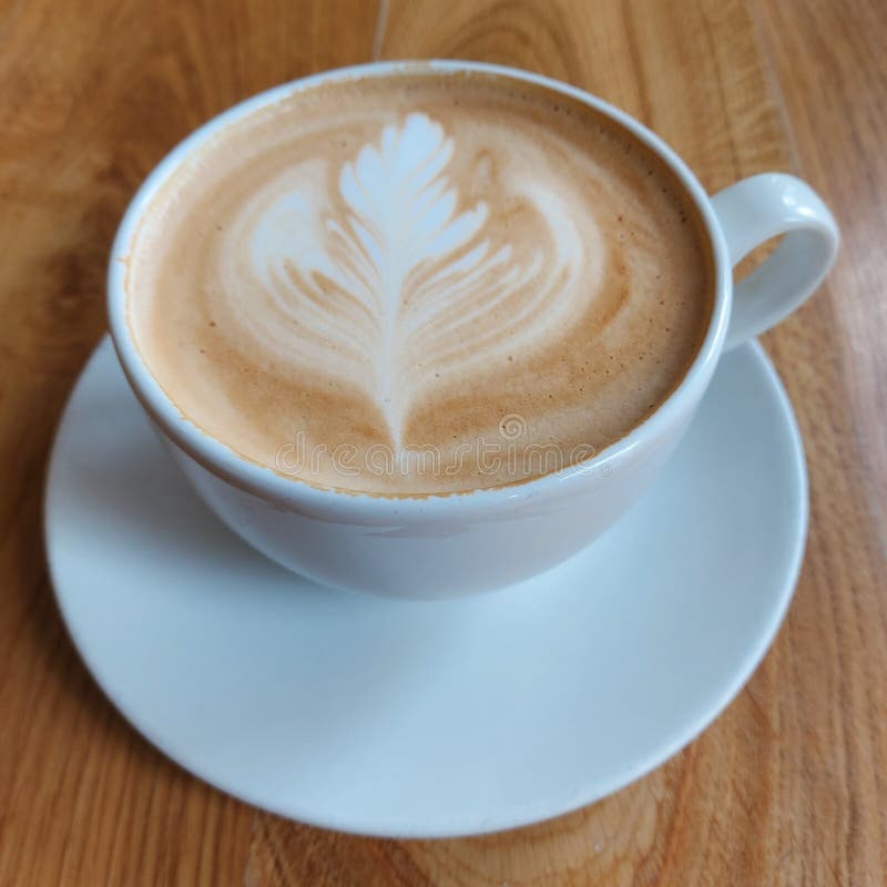 Coffee Froth Art on a Latte Coffee. Stock Photo - Image of table ...