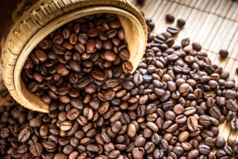 Coffee Grains on Grunge Wooden Background Stock Photo - Image of ...