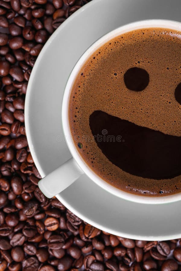 Coffee in Red Cup on a Table Surrounded by Coffee Beans. Coffee in the ...