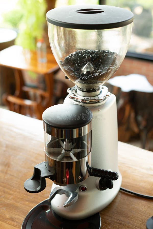 Coffee grinder in the cafe stock image. Image of black - 185135439