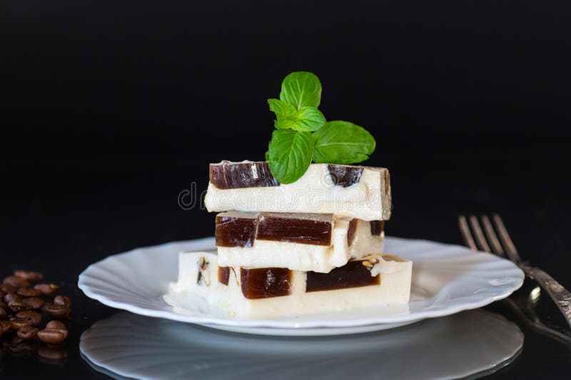Coffee Jelly Pieces Inside White Milk Jelly Stock Image - Image of ...
