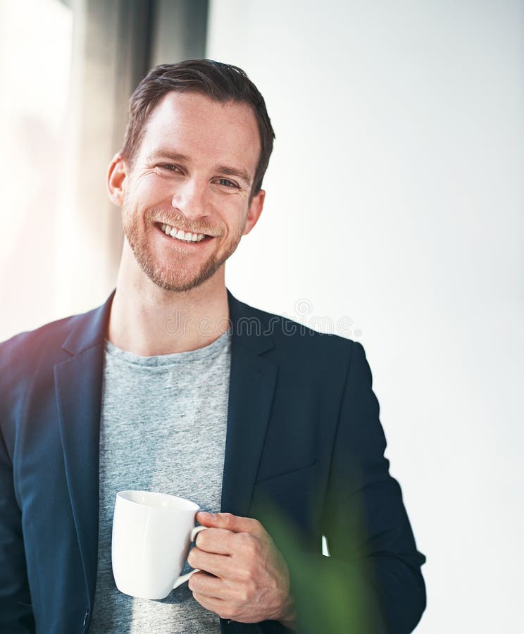 Coffee Keeps Me Going. Portrait of a Successful Businessman Drinking a ...