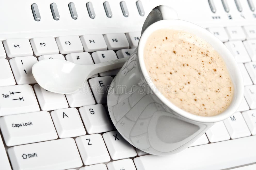 Coffee on keyboard stock photo. Image of break, espresso - 20696298