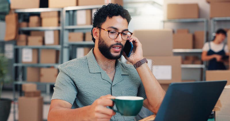 Coffee, Laptop and Phone Call with Man in Distribution Warehouse for ...