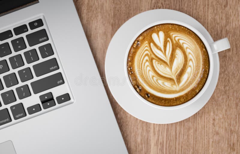 Coffee Cup with Laptop Computer White Blank Screen on Wood Work Table ...