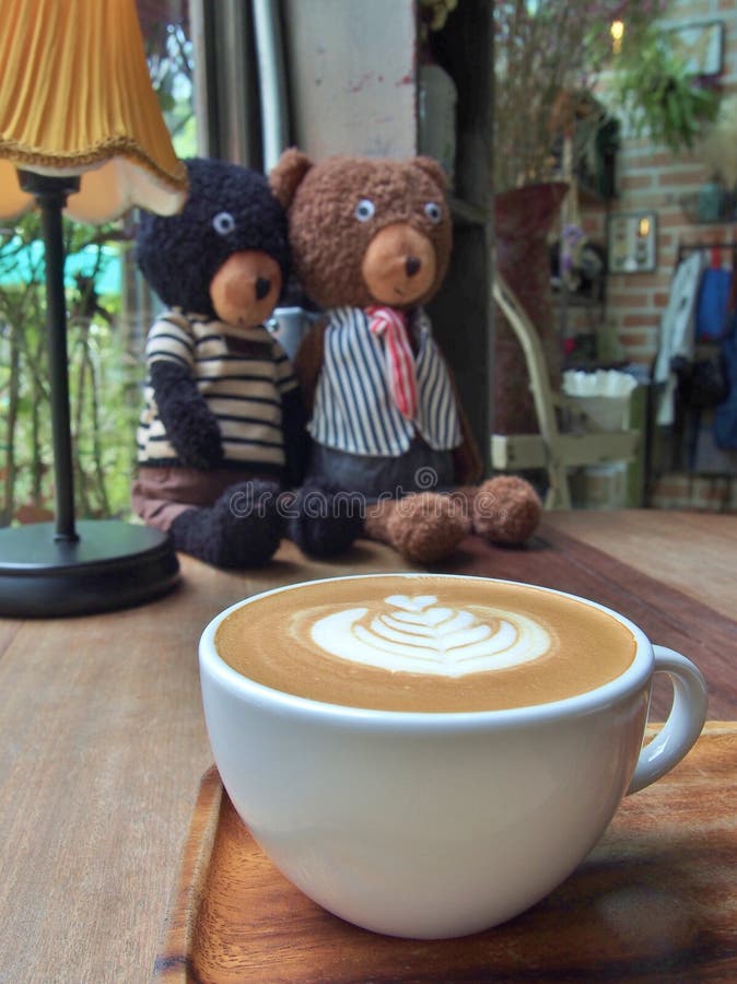 Coffee with Latte Art and Two Bear Dolls Stock Image - Image of brew ...