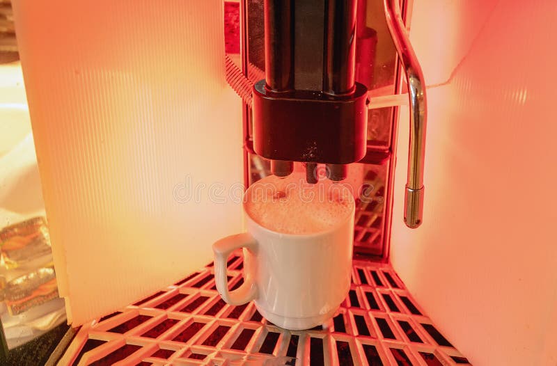 Coffee Latte Macchiato with Red Light Machine Stock Photo - Image of ...