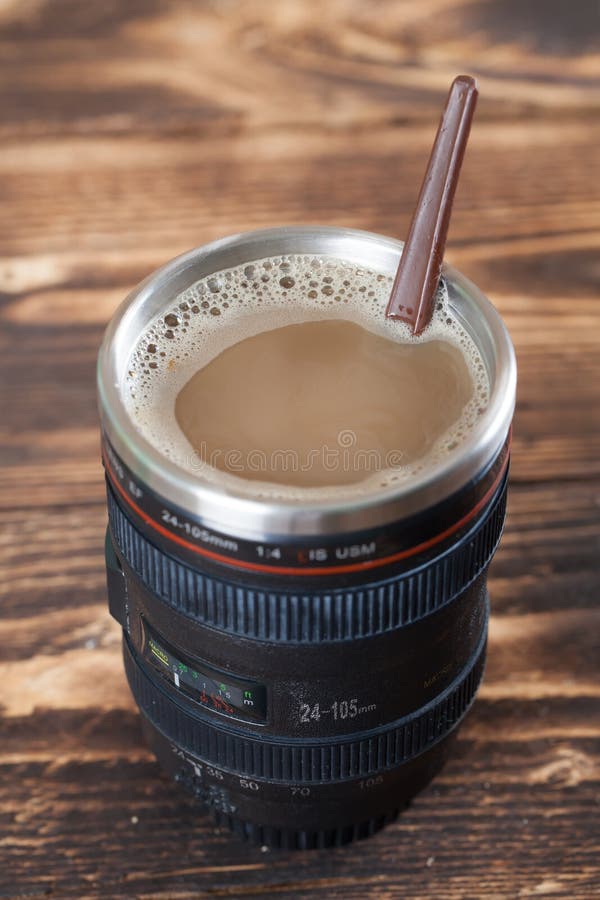 Coffee in a lens stock image. Image of vertical, milk - 67034787