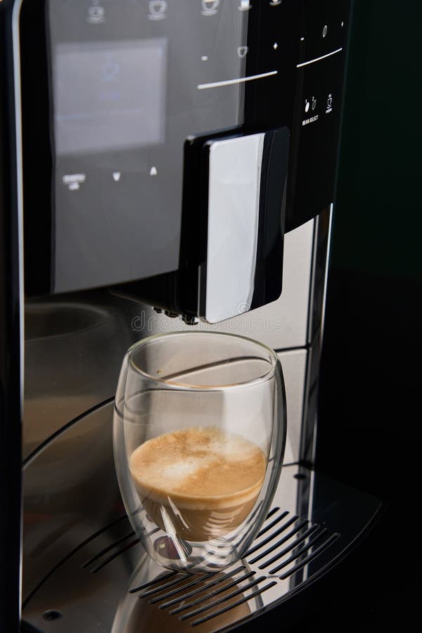 Coffee Machine Dispensing Fresh Brew into Cup Stock Photo - Image of ...