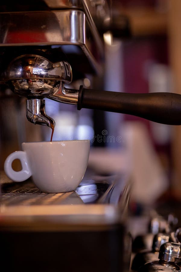 Coffee Machine Making Coffee in a White Cup Stock Photo - Image of ...