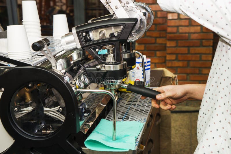 Coffee Machine Making Coffee Holded by Barista Arm Stock Image - Image ...