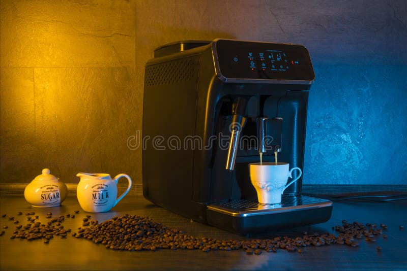 The Coffee Machine is on the Table and Makes Delicious Coffee Stock ...