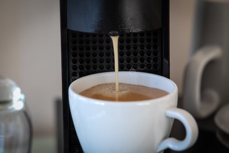 Coffee Machine and a White Cup. Breakfast and Energy Stock Photo ...
