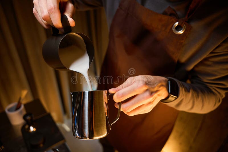 Coffee Maker or Bartender Pouring Milk from Pitcher Preparing Coffee ...
