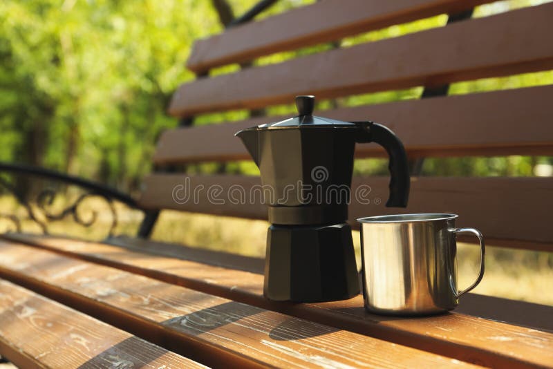 Coffee Maker and Metal Cup on Bench Outdoor Stock Photo - Image of ...