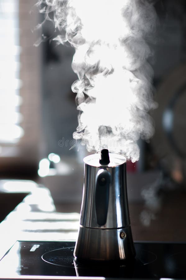 Coffee Maker on the Stove with Steam Stock Photo - Image of italy ...