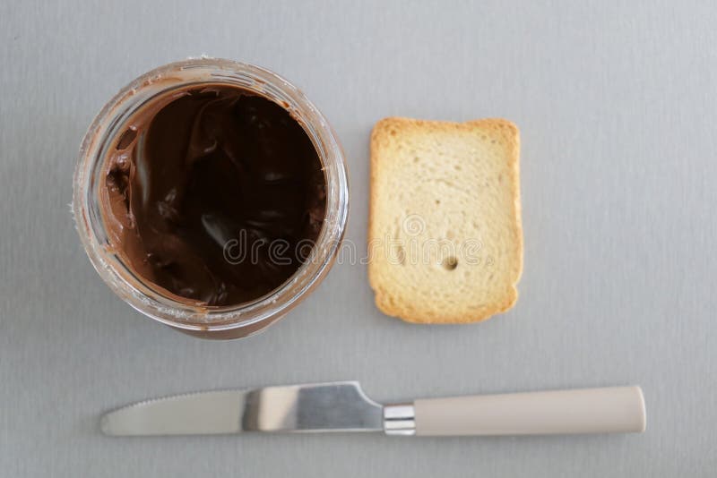 Coffee Melting Chocolate Jar and a Bread Slice Stock Image - Image of ...