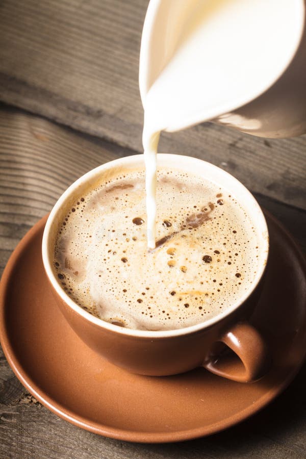 Two Cups of Coffee with Decoration and Poured Milk Stock Image - Image ...
