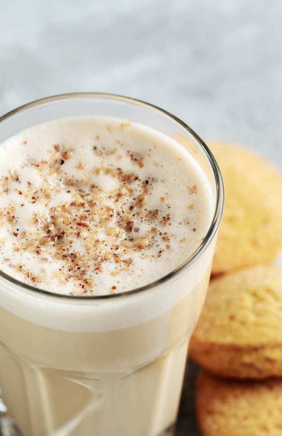 Coffee with Milk and Grated Nut in a Glass Close-up. Raff Coffee Stock ...