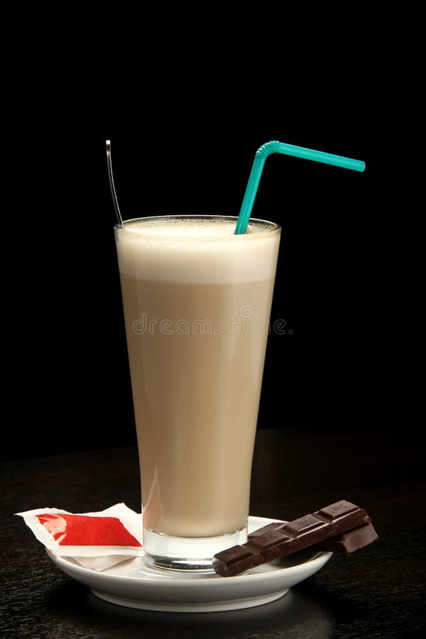 Coffee with milk stock photo. Image of latte, straw, table - 54603182