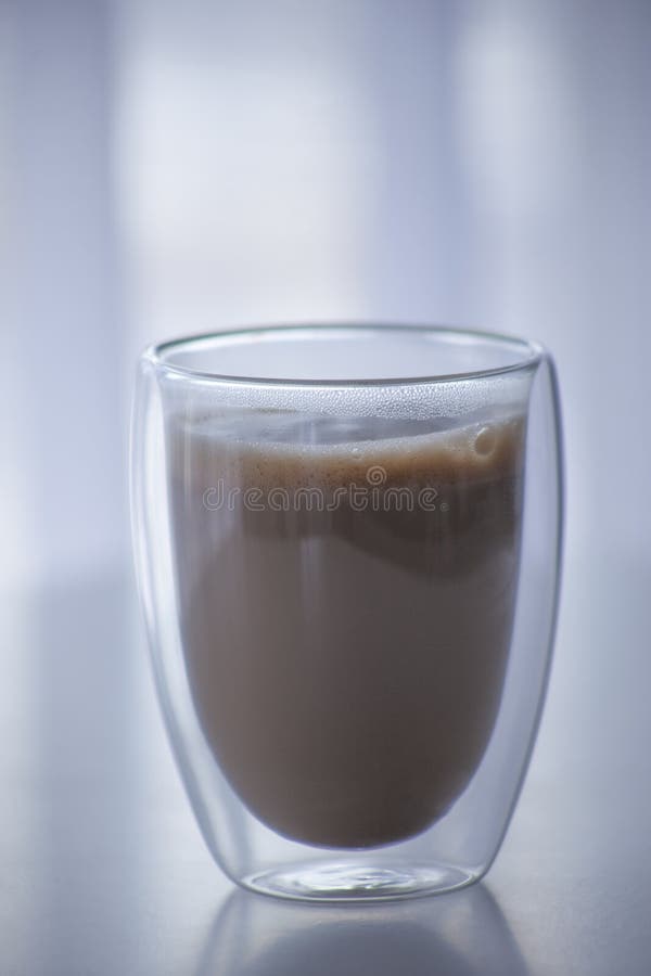 Coffee with Milk in a Transparent Glass with a Double Bottom. a Popular ...