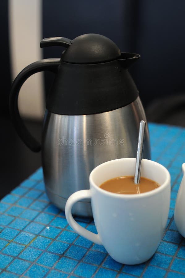 Coffee mug and bottle stock image. Image of coffee, cafeteria - 14299459