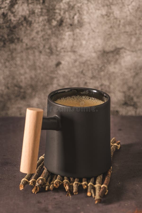 Coffee mug on a dark slate stock image. Image of roast - 303666481