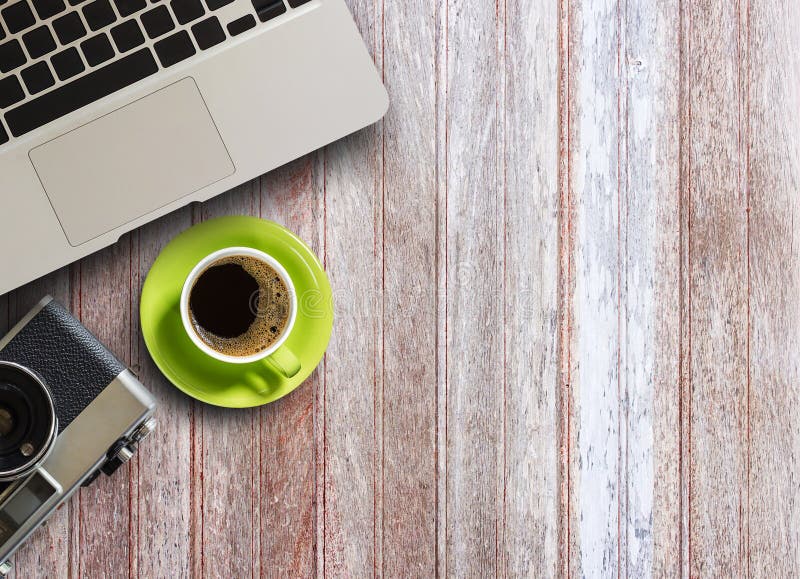 Coffee Mug, Laptop Computer and Old Camera on Wooden Stock Image ...