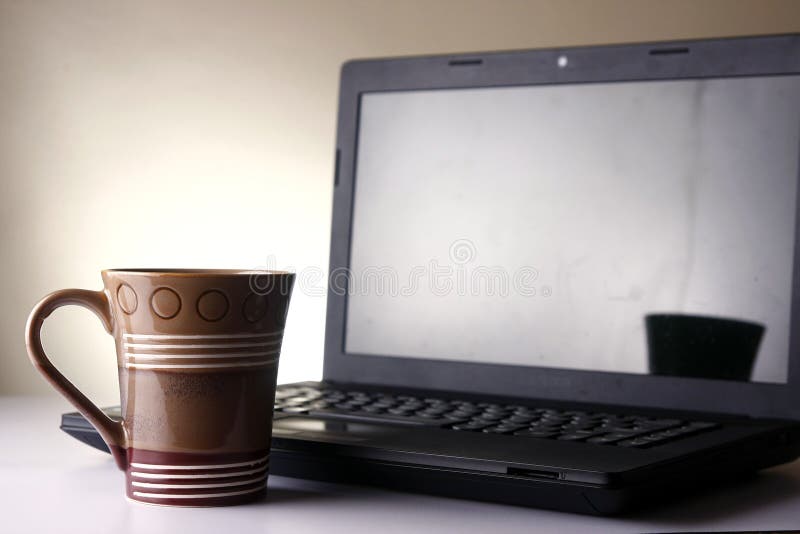Coffee Mug and a Laptop Computer Stock Photo - Image of technology ...