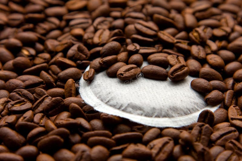 A Coffee Pad with Many Coffee Beans Stock Photo - Image of drink ...