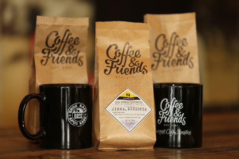 Coffee Paper Packaging with Coffee Mugs Editorial Photography - Image ...