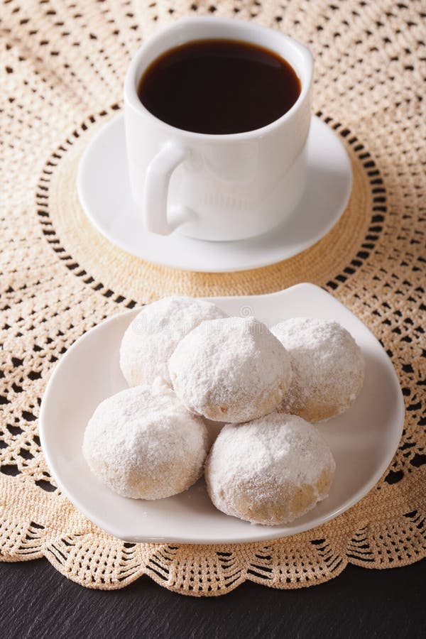Polvoron Cookies with Powdered Sugar Macro on a Table. Vertical Stock ...