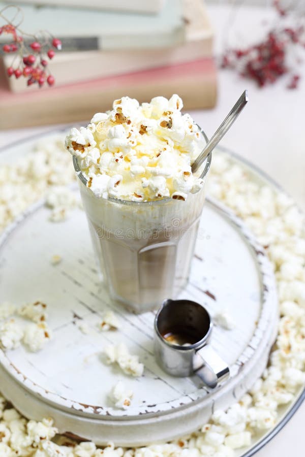 Coffee with popcorn. stock photo. Image of macchiato - 128913586