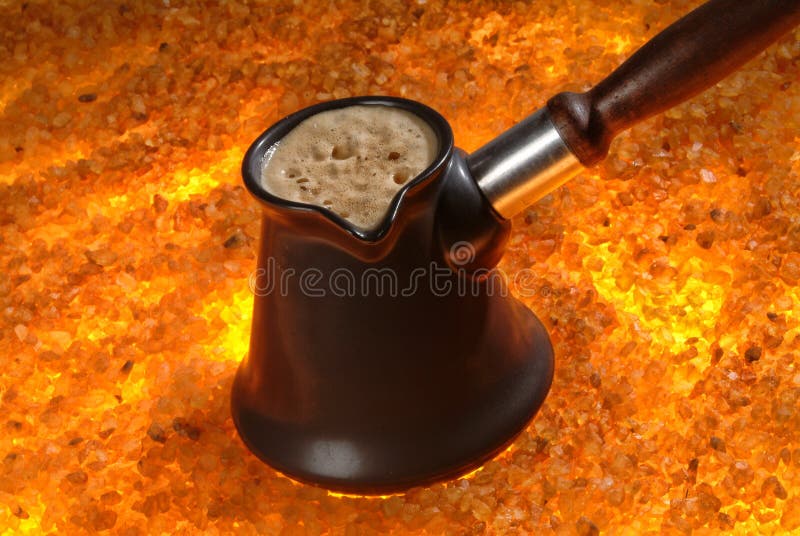 Coffee Pot on a Hot Sand stock photo. Image of drink - 202530290