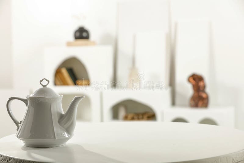 Coffee Pot on White Table Top with Blurred White Kitchen Interior ...