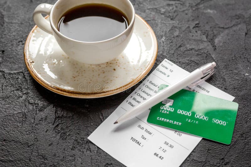 Coffee and Receipt Bill for Payment by Credit Card on Wooden Table ...