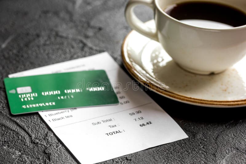 Coffee and Receipt Bill for Payment by Credit Card on Dark Table ...