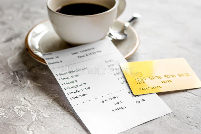 Coffee and Receipt Bill for Payment by Credit Card on Wooden Table ...