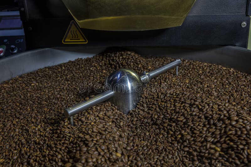 Coffee Roaster Machine at Coffee Roasting Process. Mixing Coffee Beans ...