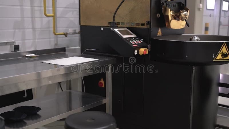 At a Coffee Roasting Plant. the Machine is in the Process of Roasting ...