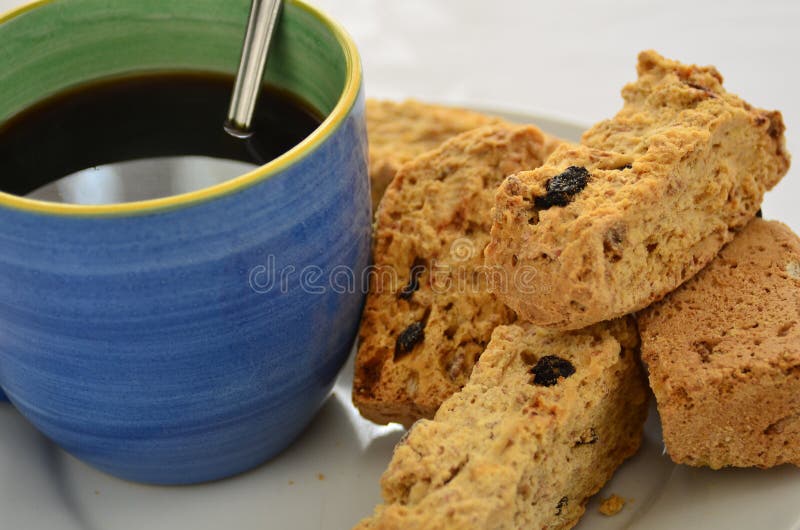 Coffee and rusks stock photo. Image of raisins, plate - 26117328