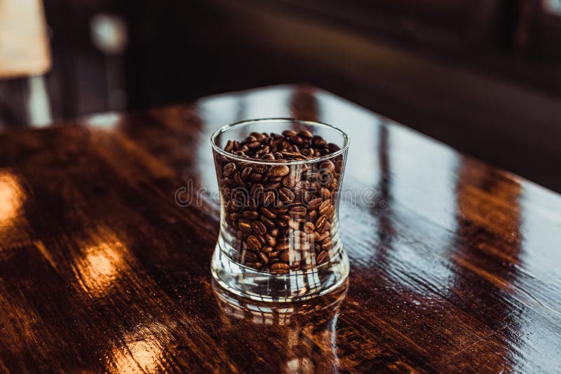 Coffee Seed in Glass on the Table Stock Photo - Image of green, food ...