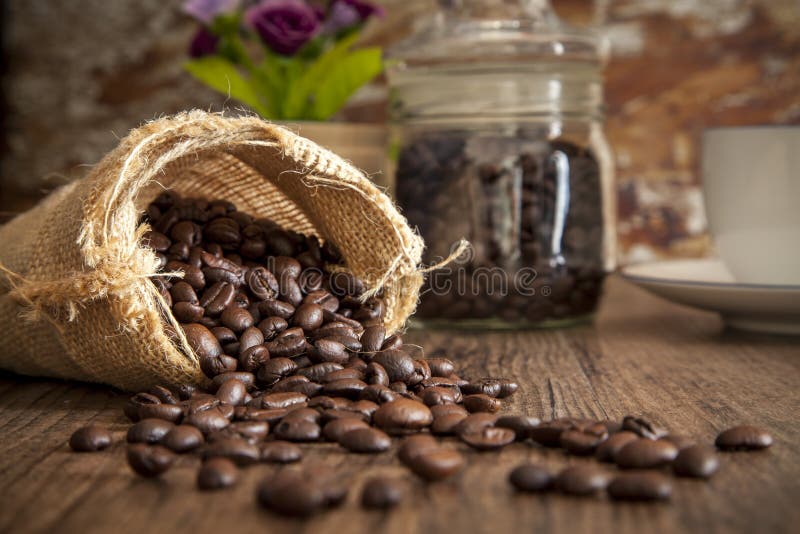 Coffee Seed in Sack on Wood Table with Natural Light Stock Photo ...