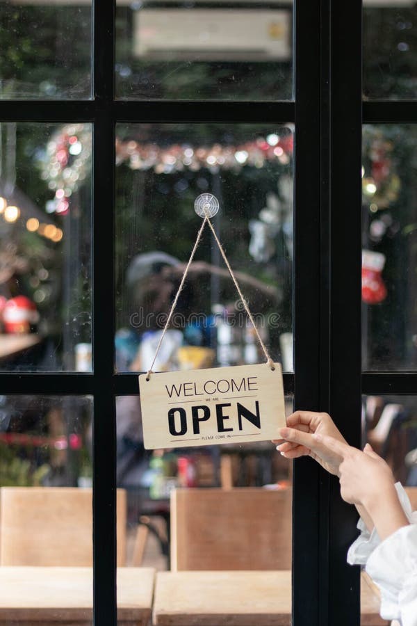 Coffee Shop Employees are Flipping Store Opening Sign Installed on ... Coffee Shop Employees are Flipping Store Opening Sign Installed on ...