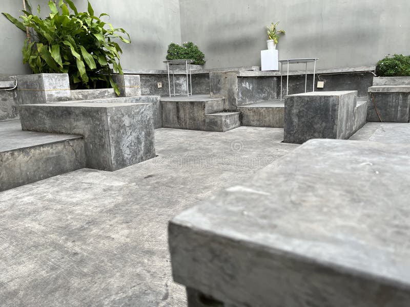 Coffee Shop Interior Featuring Table and Chair Made from Concrete Stock ...