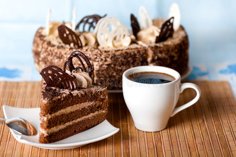Coffee ,a Slice of Cake on a Plate Stock Photo - Image of form, spoon ...